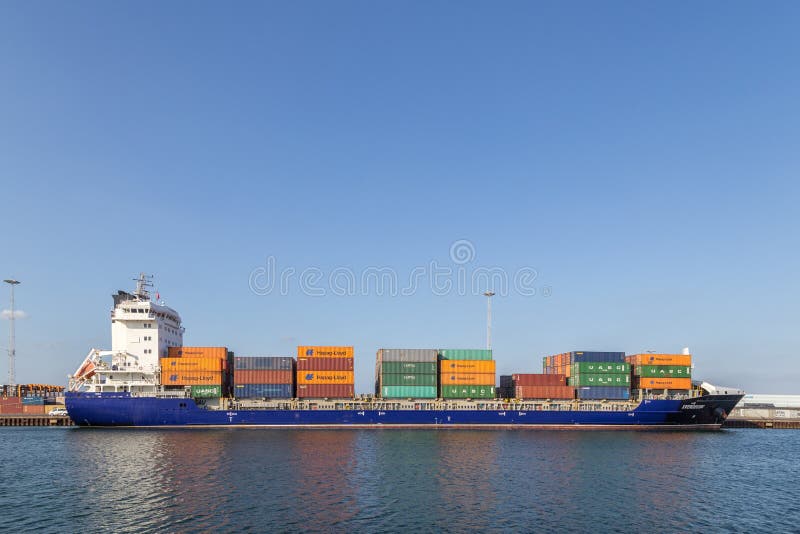 Container ship side view editorial photography. Image of port - 114752197