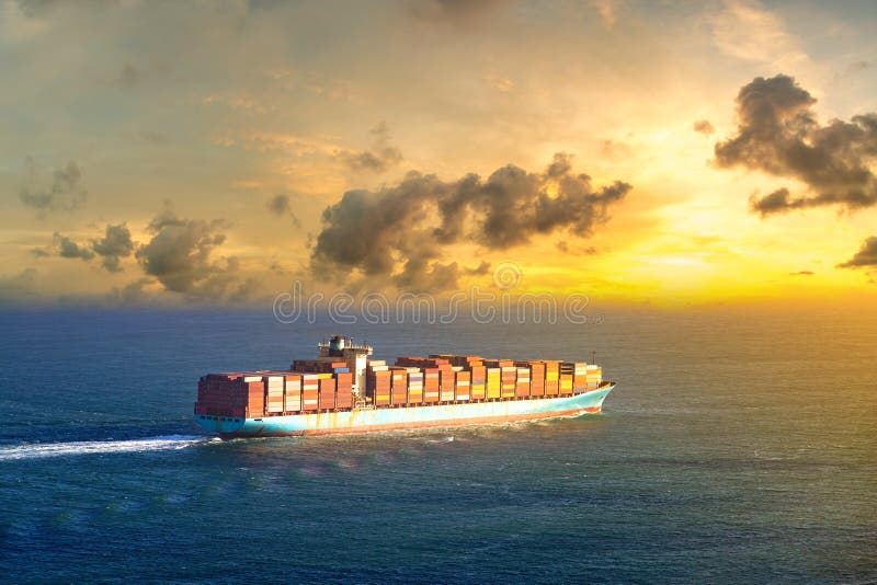 Container ship at sunset stock image. Image of heavy - 254803699