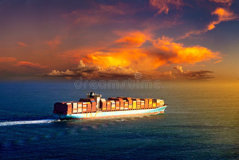 Container ship at sunset stock image. Image of heavy - 254803699