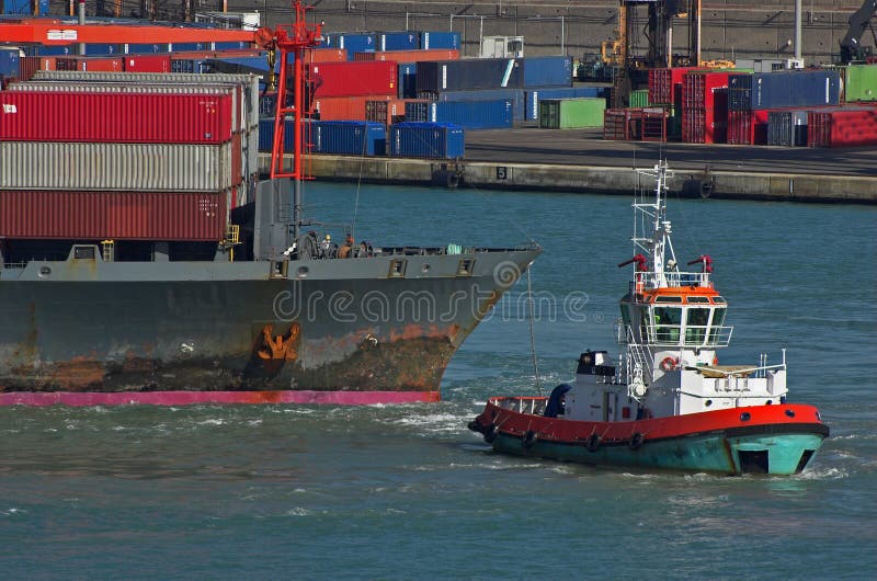 Container Ship and Tag Boat Stock Image - Image of commerce, customs ...