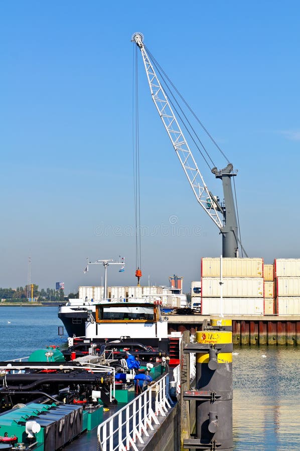 Container Ship Unloading in the Harbor Stock Photo - Image of water ...
