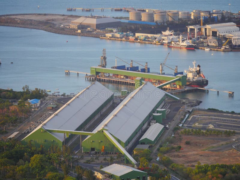 Container Ship Unloading at Harbour Terminal in Blue Sea Editorial ...