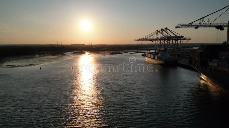 Container Ships at Southampton Docks during Sunset with River Delta ...