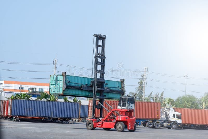 Container Handlers are Loading Containers into Trucks Stock Image ...