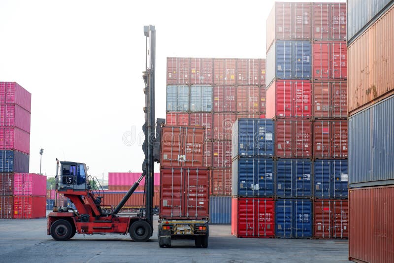 Container Handlers are Loading Containers into Trucks Stock Image ...