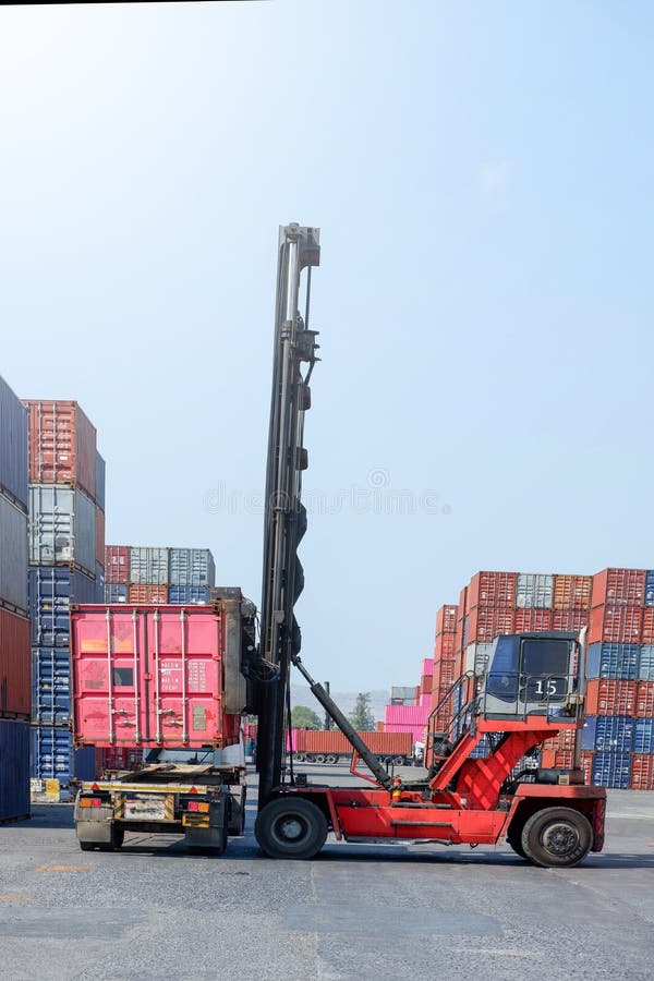 Container Handlers are Loading Containers into Trucks Stock Image ...