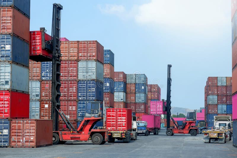 Container Handlers are Loading Containers into Trucks Stock Image ...