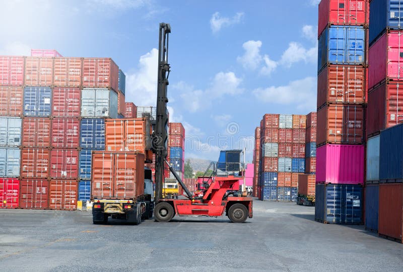 Container Handlers are Loading Containers into Trucks Stock Photo ...