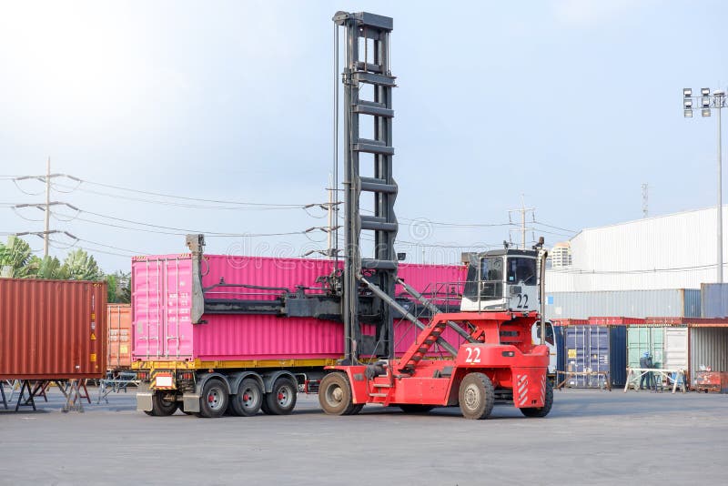 Container Handlers are Loading Containers into Trucks Stock Photo ...