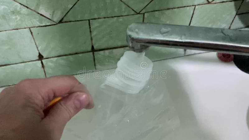 A Container for Storing and Transporting Water is Filled Stock Footage ...