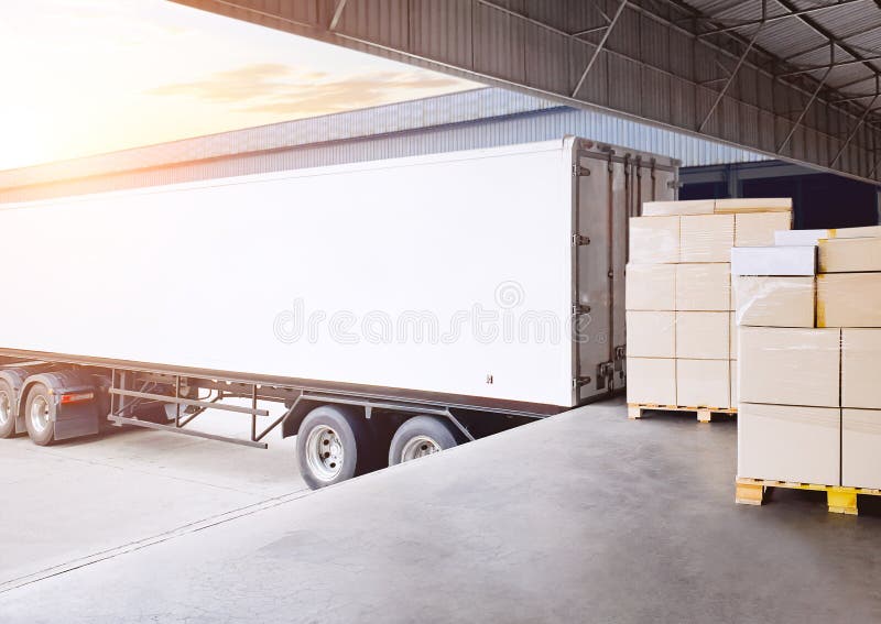 Container Trailer Trucks Loads Bulk of Package Boxes at Warehouse Dock ...