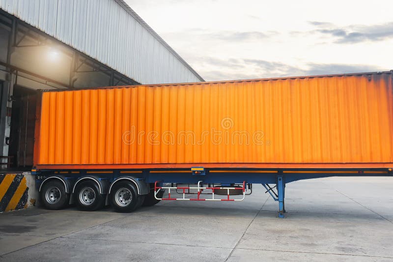 Container Trucks Loading at Dock Warehouse. Container Shipping ...
