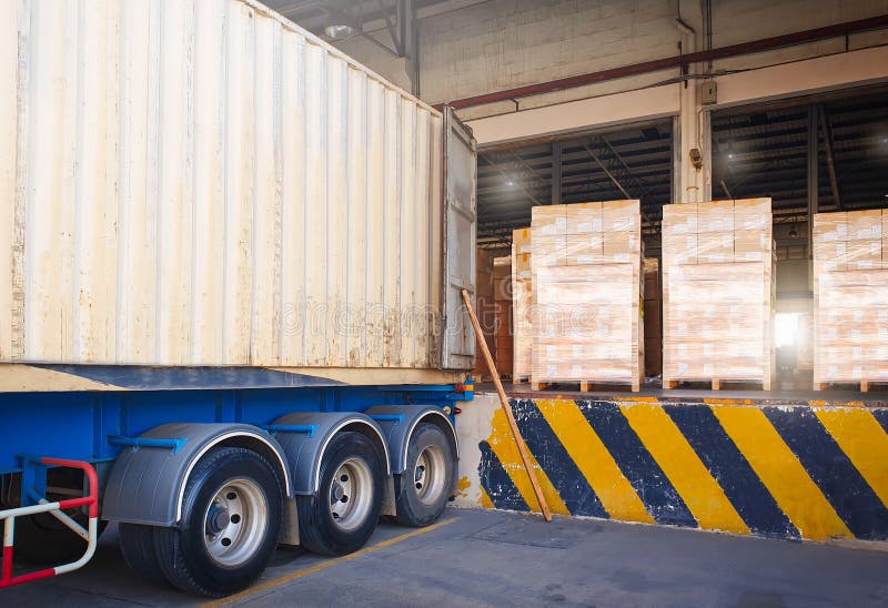 Boxes and Pallets Visible through a Window at a Large Warehouse.. Stock ...