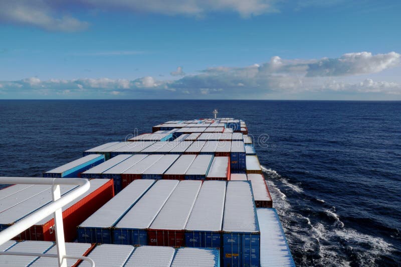 Container Vessel Covered with Snow on Top of the Container Sailing Over ...
