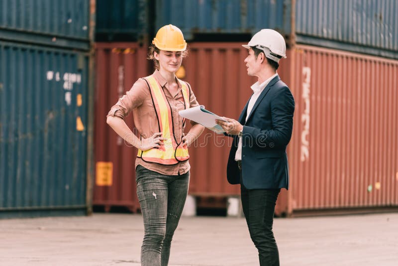 Container Yard Manager Talking To Female Foreman about Document of the ...