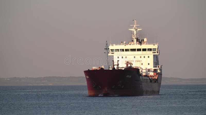 A Containerized Cargo Ship Enters the Port for Unloading Stock Video ...