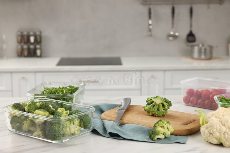 Containers with Different Fresh Products on White Marble Table, Space ...