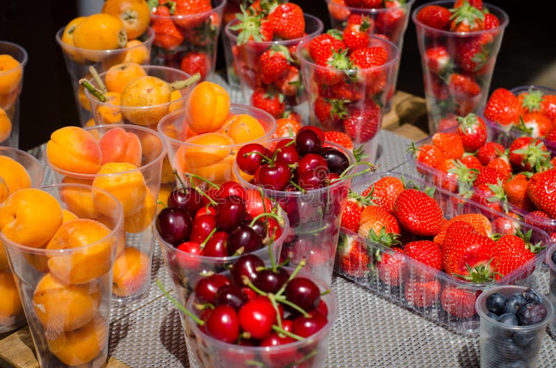 Containers of Fresh Berries on Display in a Store Stock Image - Image ...