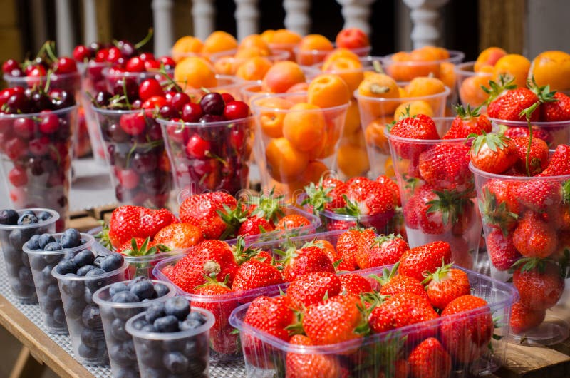 Containers of Fresh Berries on Display in a Store Stock Image - Image ...