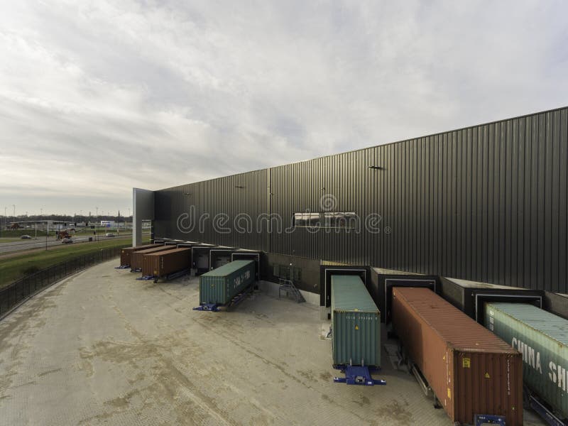 Containers in Front of the Loading Docks of a Warehouse Editorial Image ...