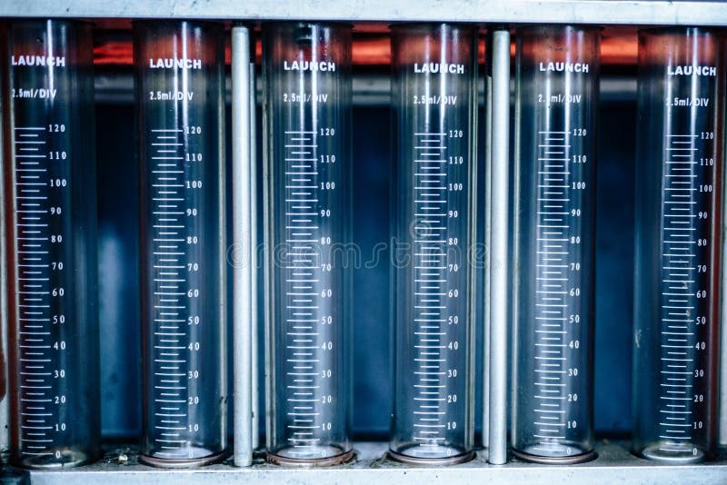 Containers with a Scale in the Device Stock Photo - Image of container ...