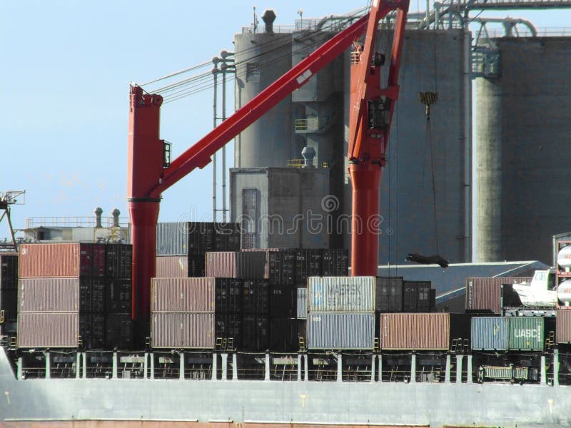 Containers on a ship editorial stock photo. Image of crane - 39555838