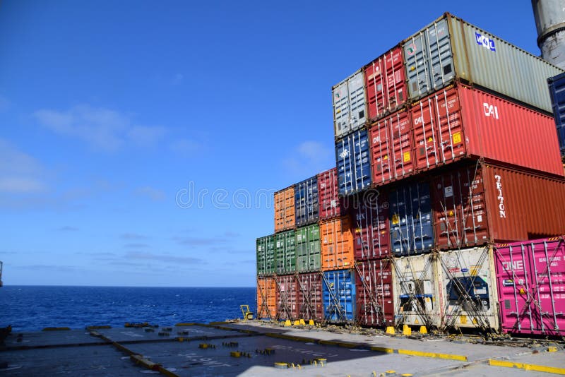 Containers stacked on deck editorial photo. Image of vehicle - 222920916