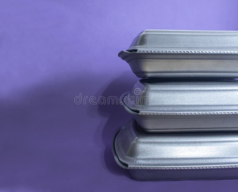 Containers To Go. Silver Container on a Blue Background Stock Photo ...