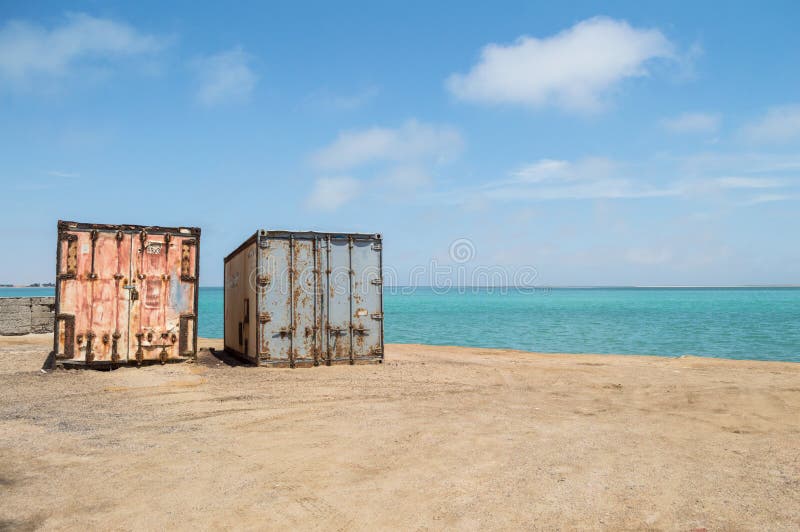 Containers by a Turquoise Sea in Walvisbay, Namibia Stock Photo - Image ...