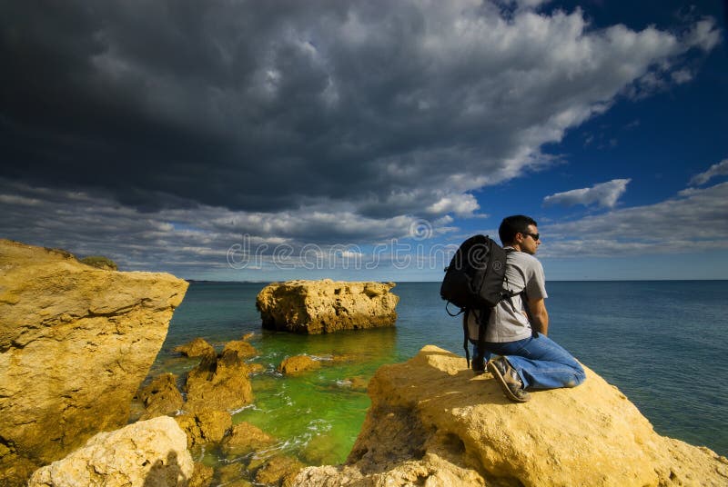 Contemplating stock photo. Image of rock, warm, color - 4715704