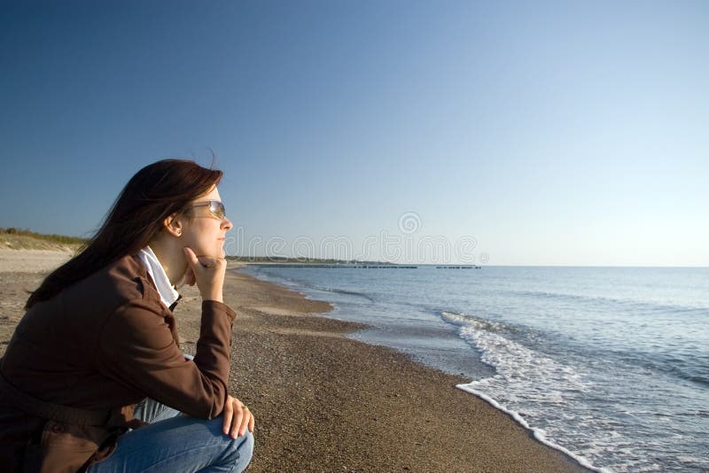 Contemplating the sun stock photo. Image of coast, attractive - 2484870