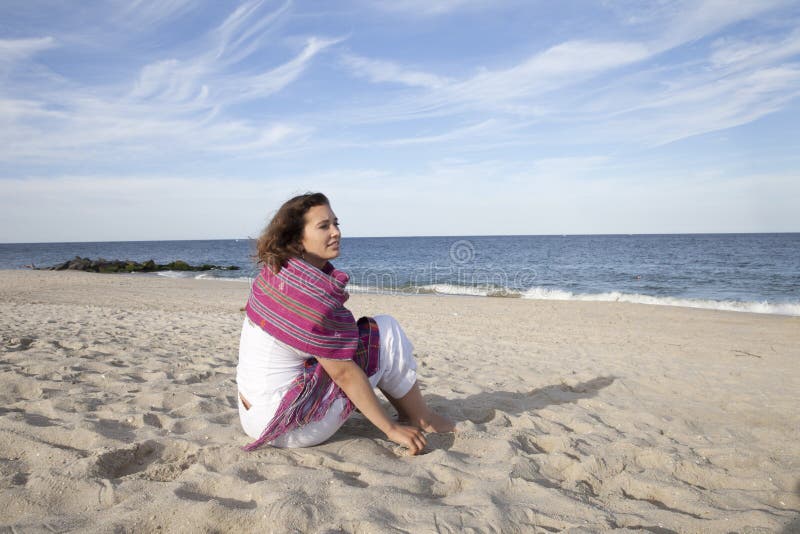 Contemplation at the beach stock image. Image of sand - 41851229