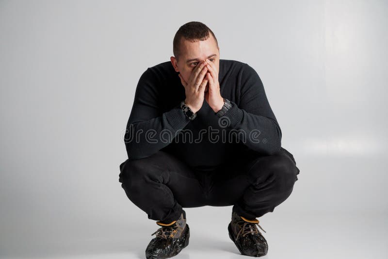 Contemplative Man in Athletic Wear Expressing Deep Thought Stock Image ...