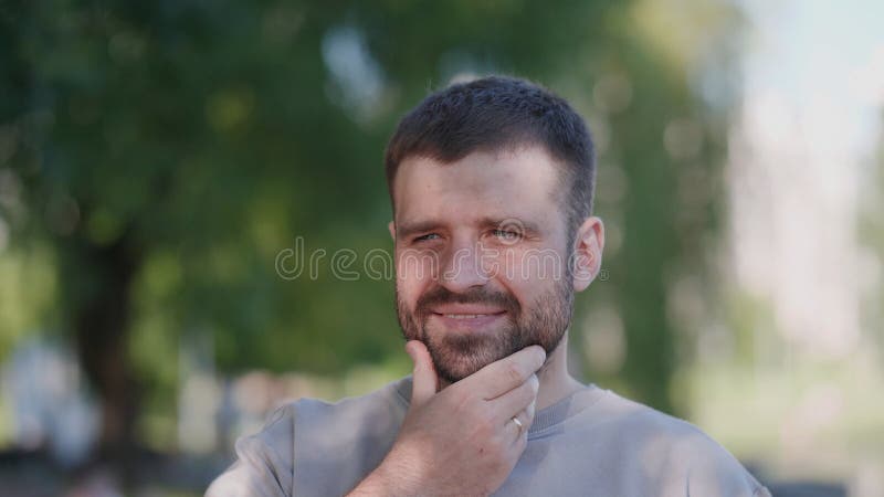 A Contemplative Man with a Thoughtful Expression Bathed in Beautiful ...