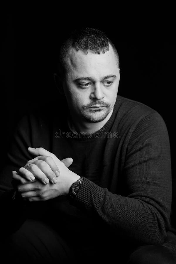 Contemplative Man in Thoughtful Pose Stock Photo - Image of white, dark ...