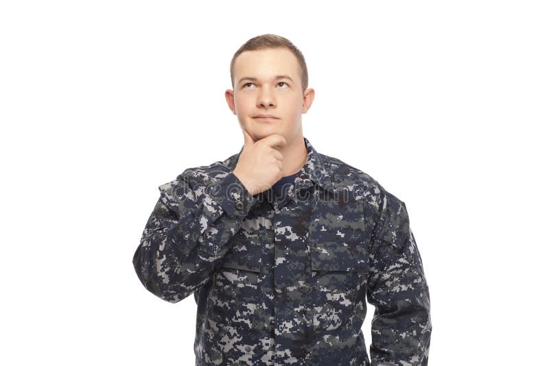 Contemplative Young Navy Man with Hand on Chin Stock Image - Image of ...