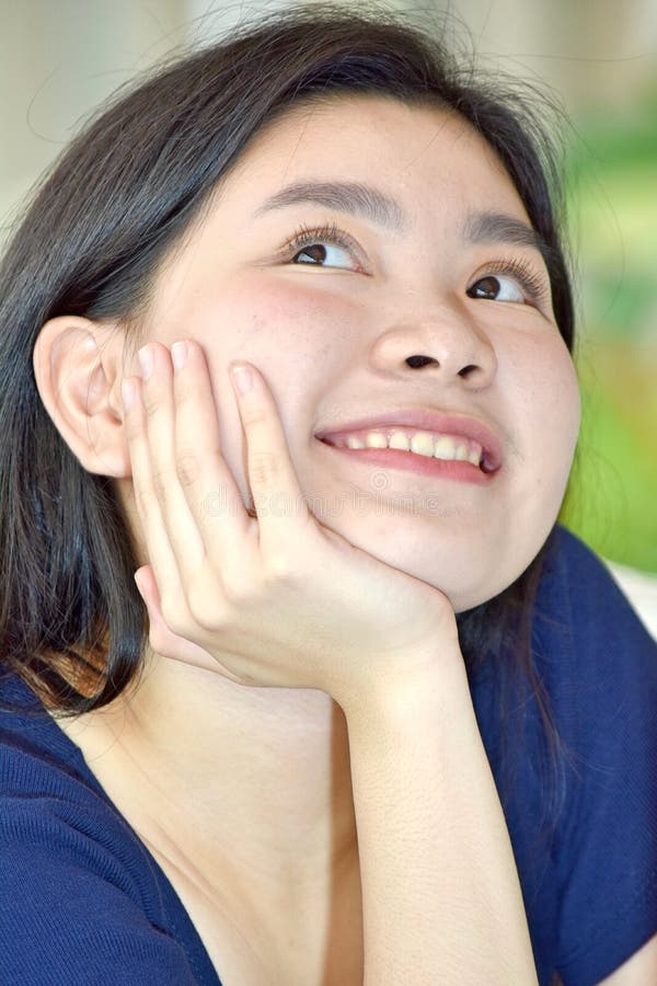 A Contemplative Youthful Person Stock Photo - Image of thought ...