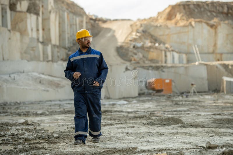 Contemporary Builder Moving Down Construction Site Stock Photo - Image ...