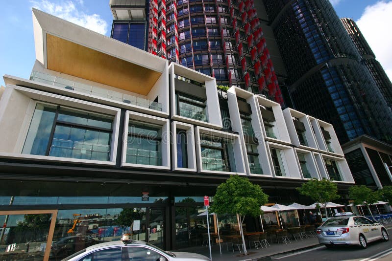 Modern Retail Podium with White Framed and Glazed Facade at Tower Base ...