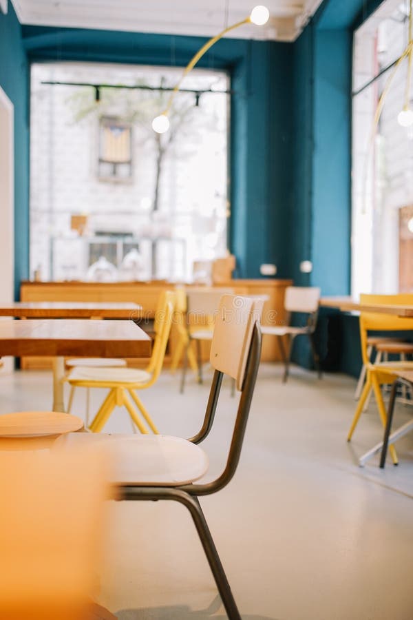 Contemporary Cafe with Wooden Chairs and Tables Stock Photo - Image of ...