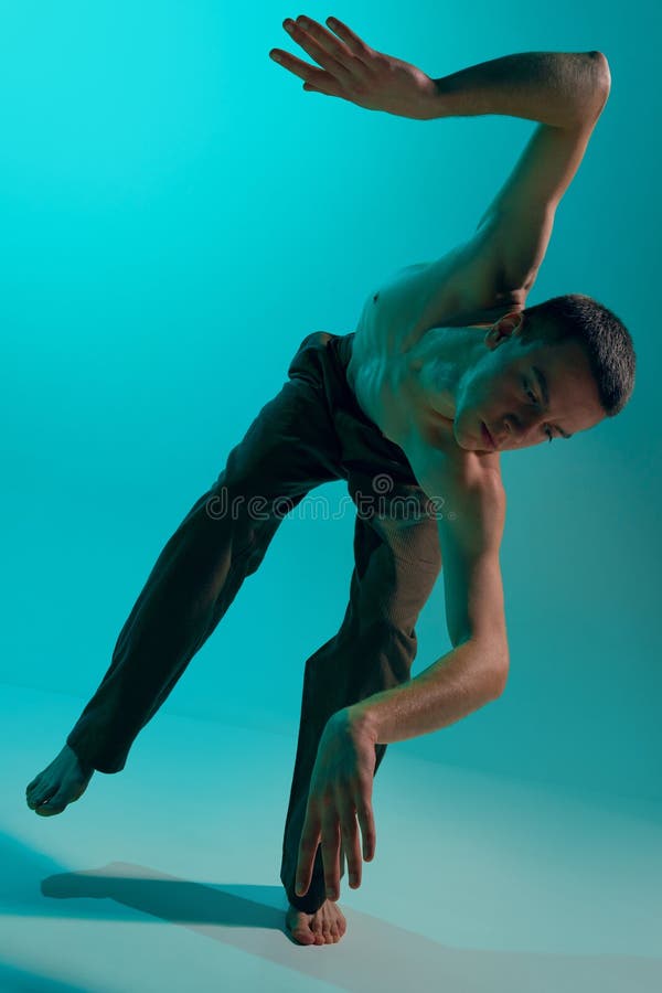Contemporary Dance Style. Young Flexible Shirtless Man Dancing ...