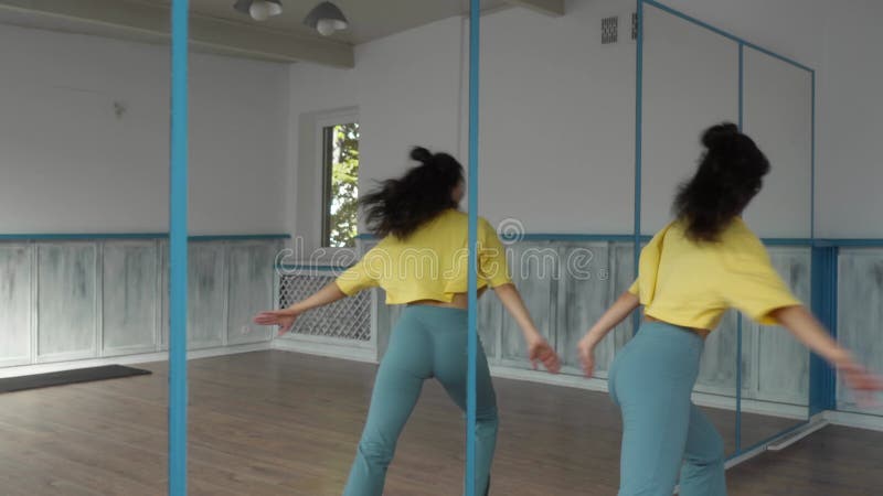 A Dancer Moves Fluidly with Expressive Arm Gestures, Highlighting ...