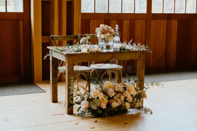 Contemporary Dining Table with Chairs and Floral Decorations for the ...
