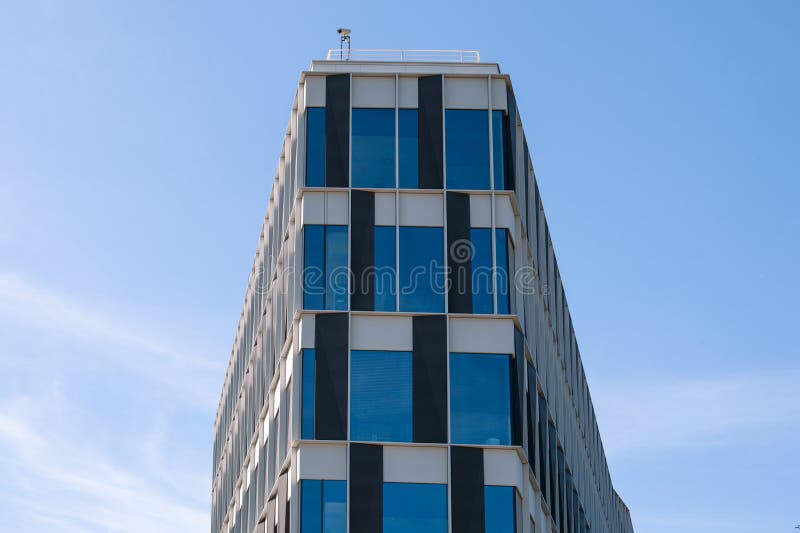 Contemporary High-Rise Building with Blue Windows Stock Image - Image ...
