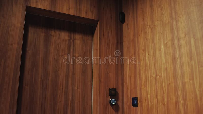 A Contemporary Modern Wooden Elevator Featuring Advanced Touch Controls ...