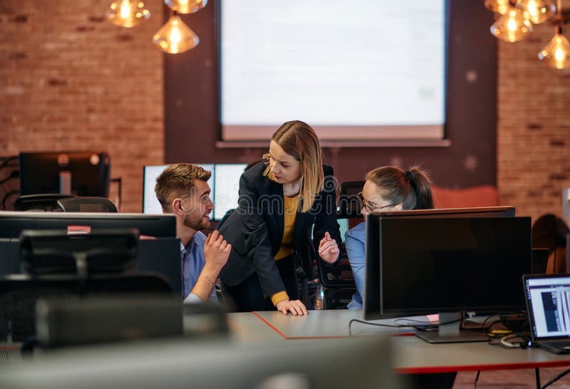 Strategic Business Meeting: Group of Professionals Collaborating in ...