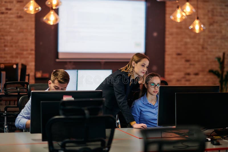 Strategic Business Meeting: Group of Professionals Collaborating in ...