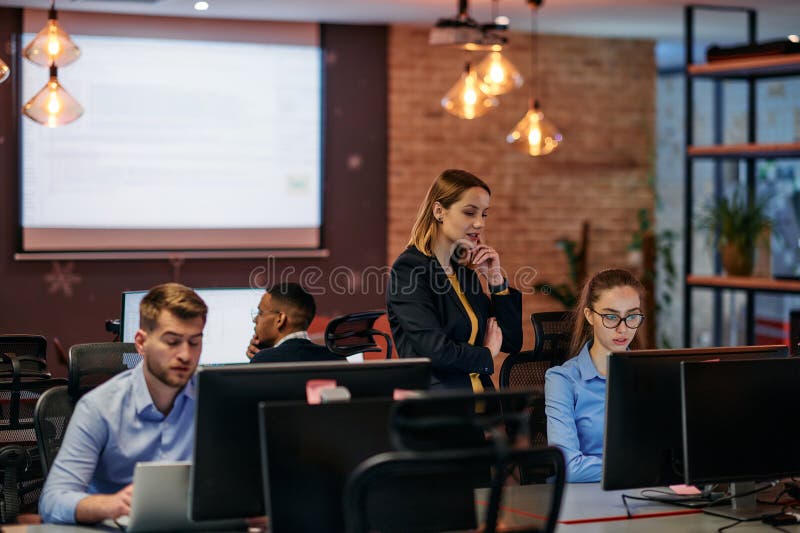 Strategic Business Meeting: Group of Professionals Collaborating in ...