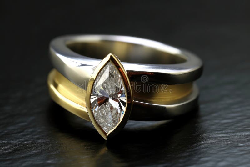 A Contemporary Ring with a Double Band and a Pearshaped Diamond White ...