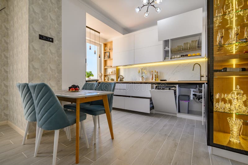 A Contemporary White Kitchen with Extended Drawers Stock Image - Image ...